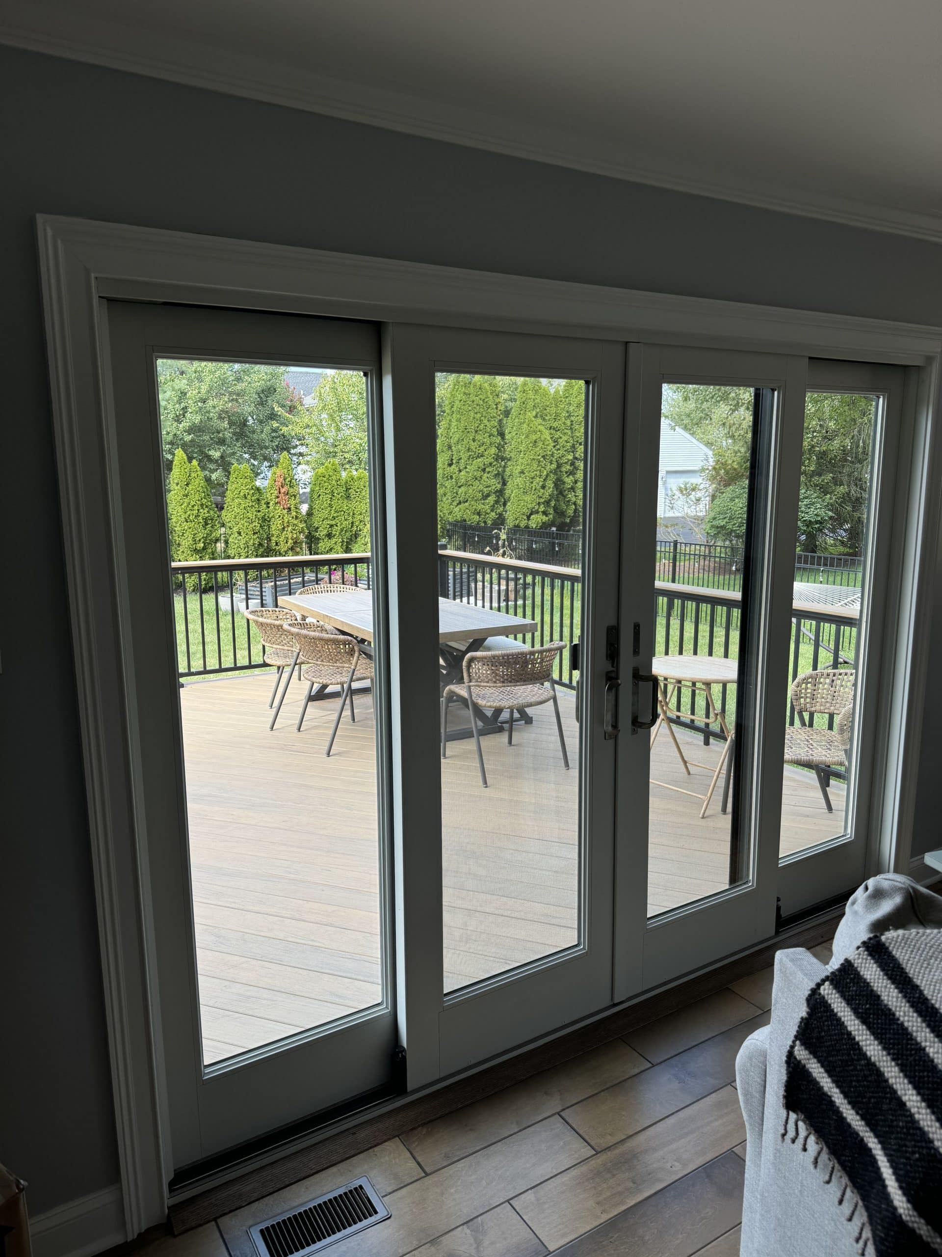 Composite Deck with 9’ Anderson Sliding door - J. Tretter & Sons - Projects
